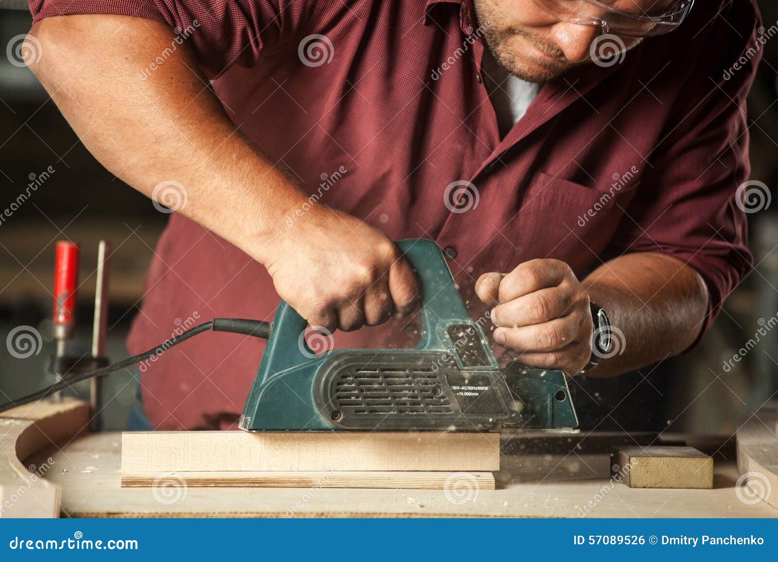 Carpenter Working with Electric Planer. Stock Photo - Image of ...