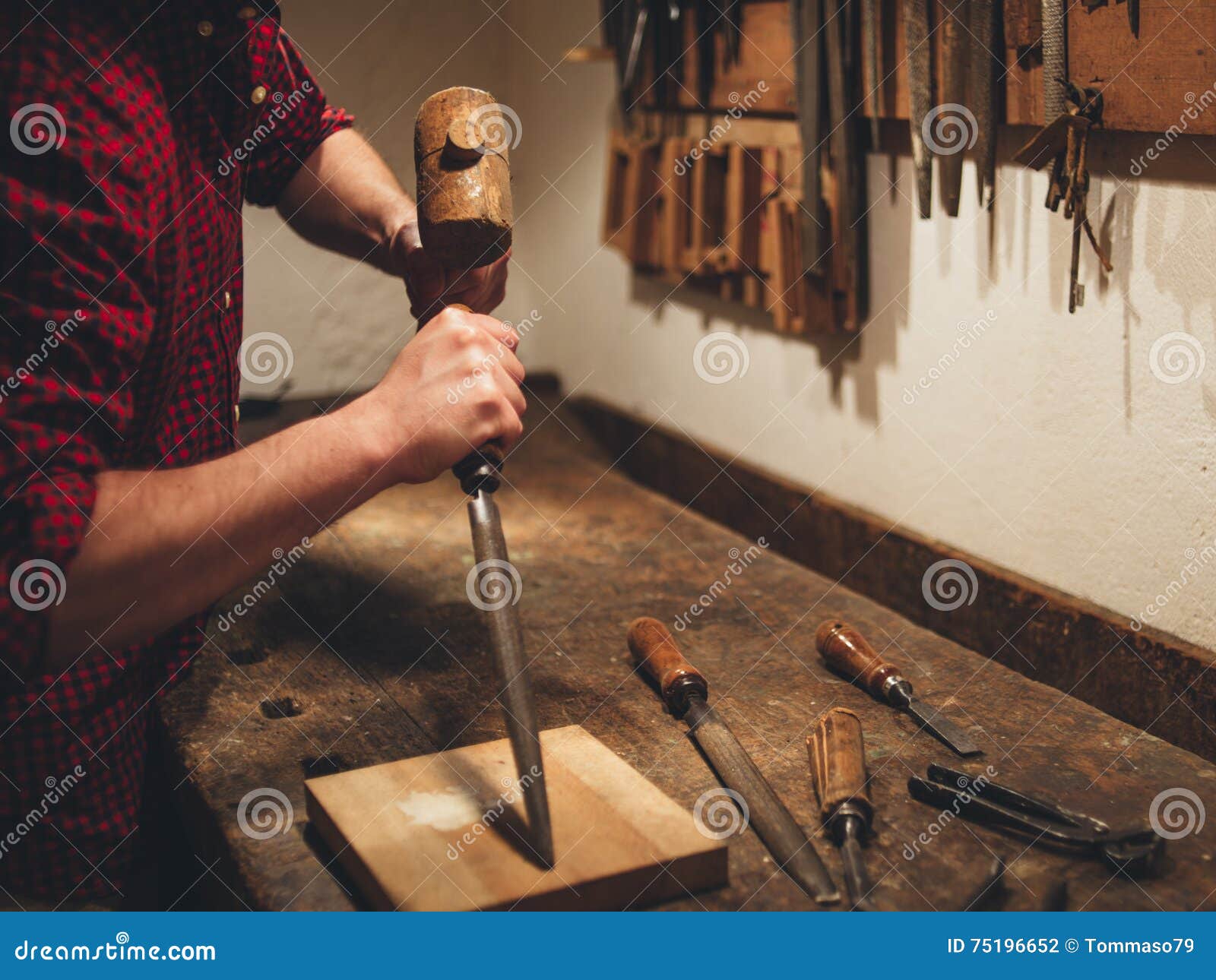 Carpenter working hard stock photo. Image of equipment - 75196652