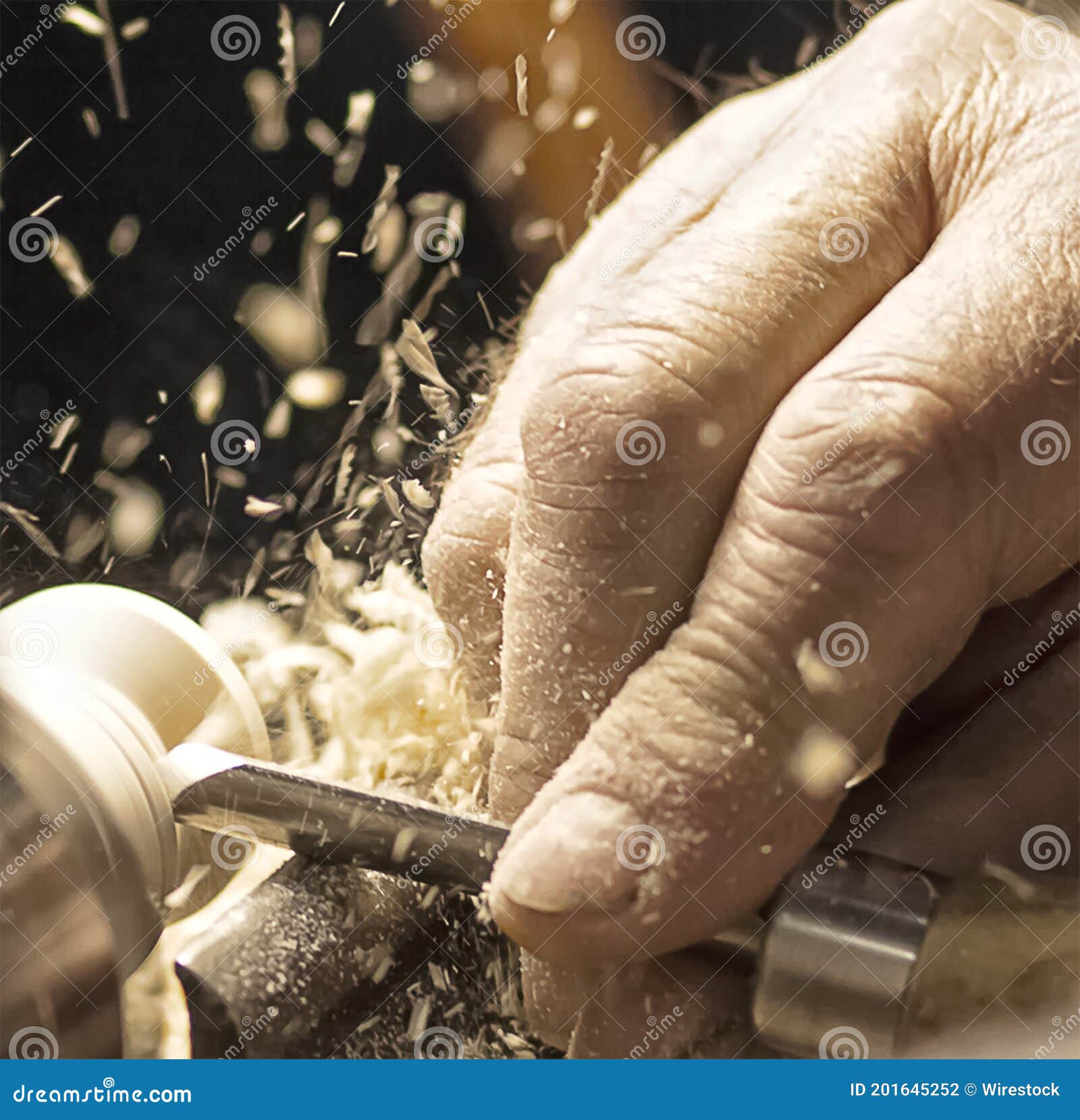 Carpenter Working with a Machine and Splinters All Around Stock Photo ...