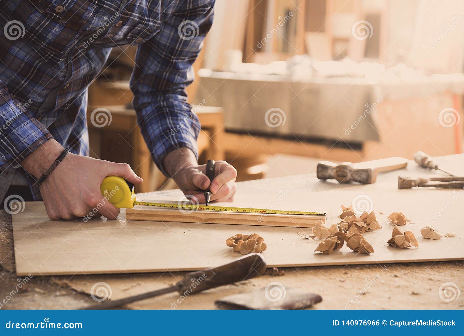 Carpenter Working with Meter or Rule Taking Measures on Wood Using ... Carpenter Working with Meter or Rule Taking Measures on Wood Using ...