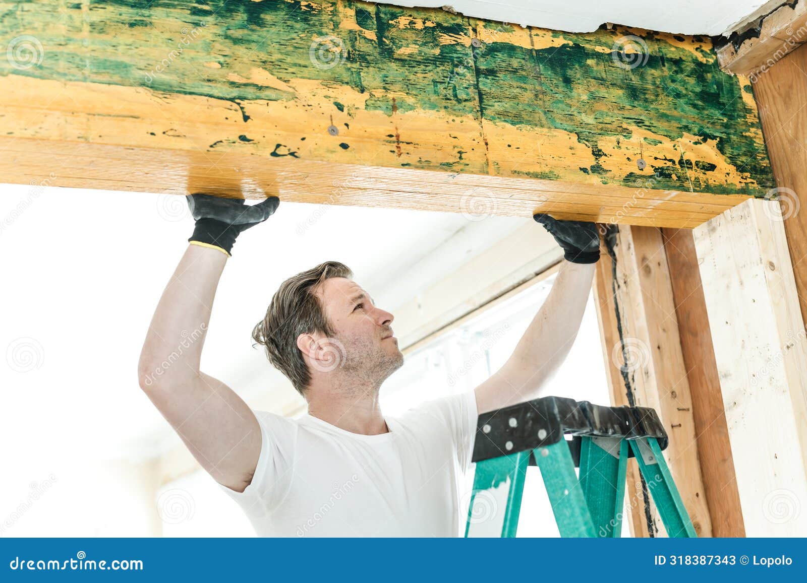 Carpenter Men Working in an Old House Installing Beam Stock Image ...