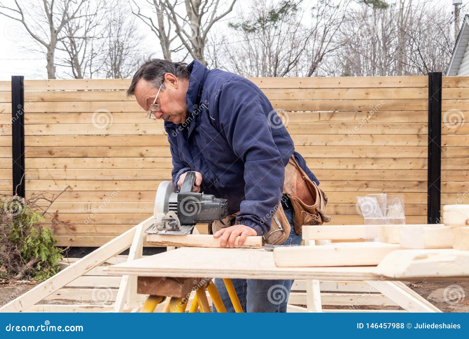 Carpenter Working on Wood Structure Stock Photo - Image of lumber ...