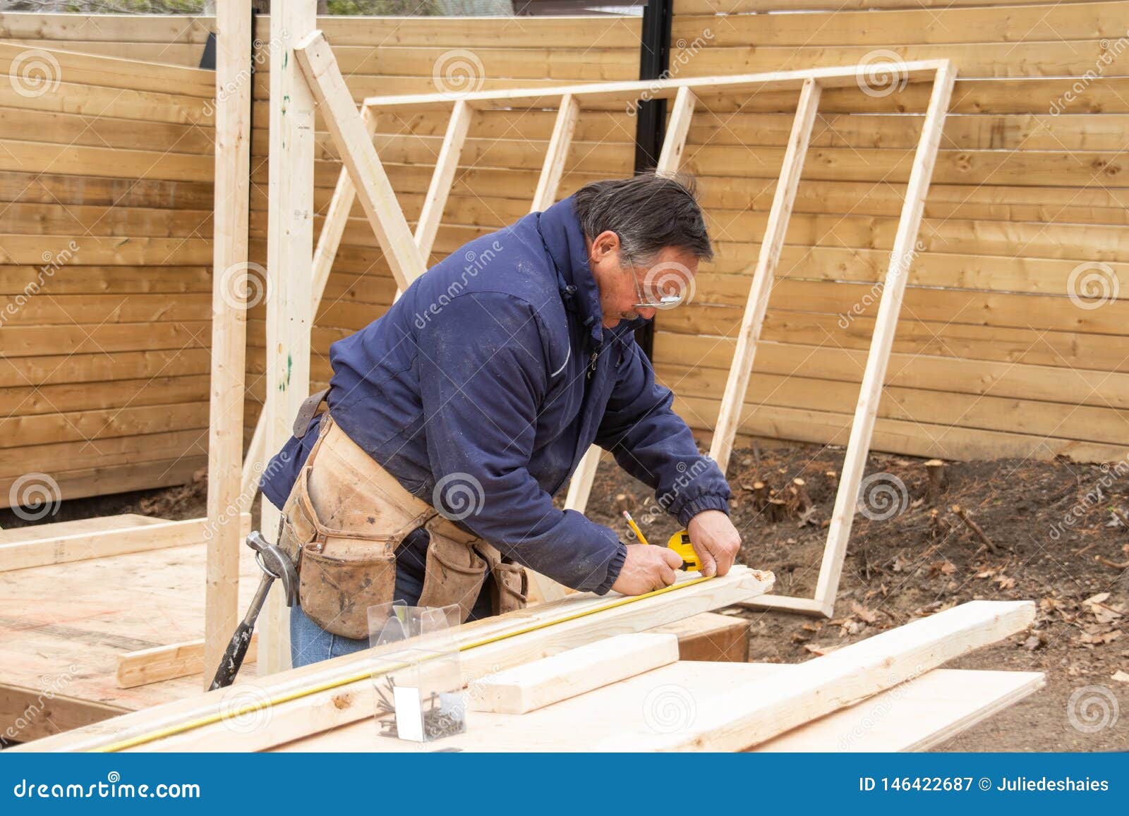 Carpenter Working on Wood Structure Stock Image - Image of senior ...