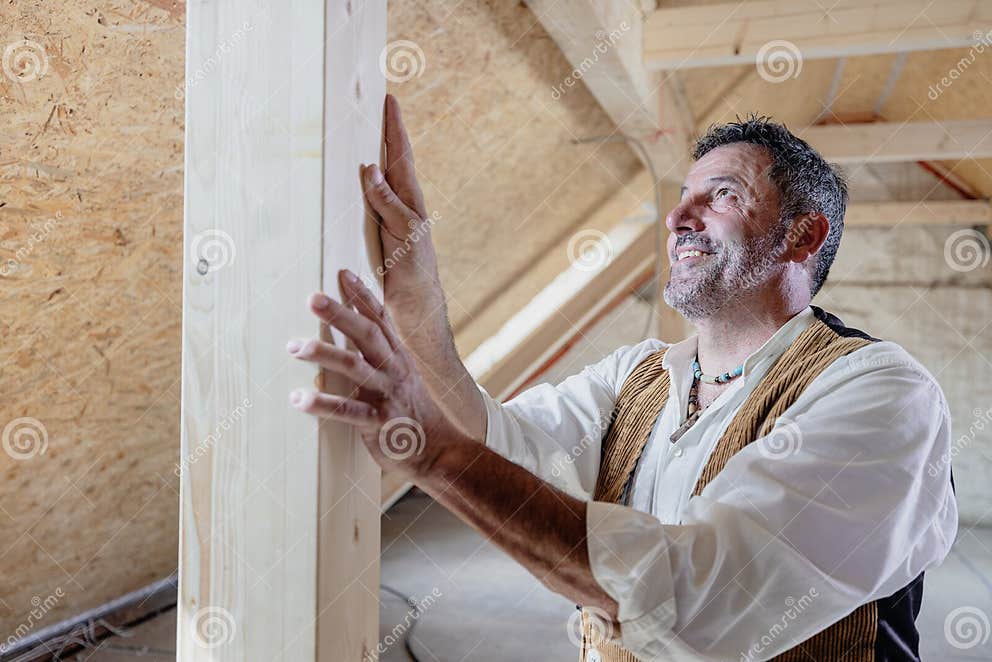 Carpenter Working on Wooden Beams and Framework Stock Photo - Image of ...