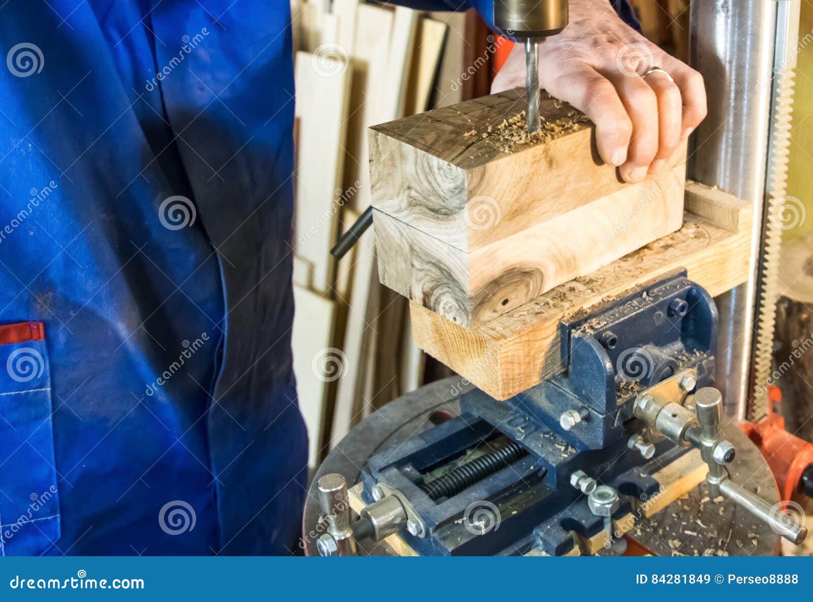 Carpenter Workplace- Man Using a Drill Press on Wood. Stock Image ...