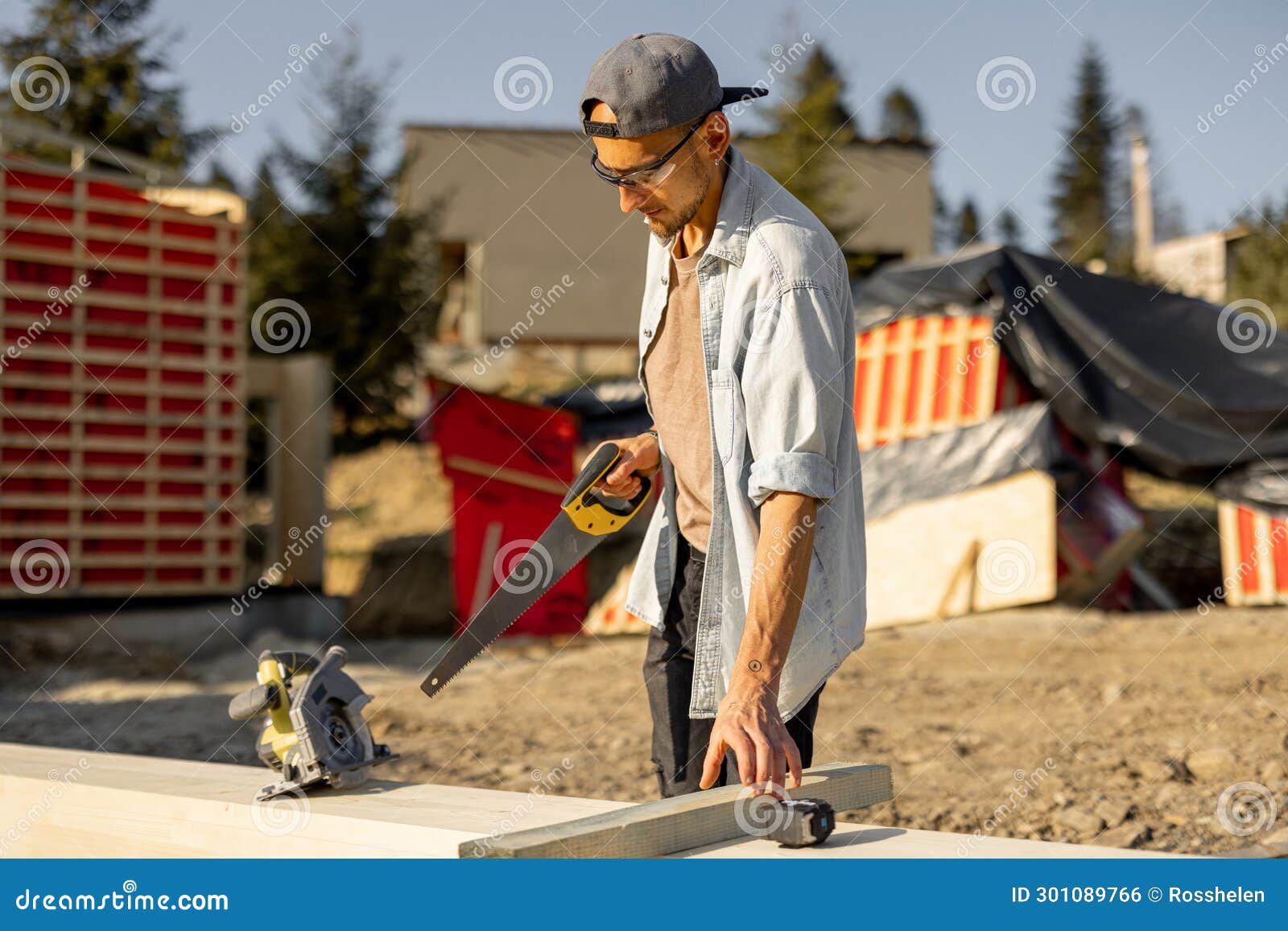 Carpenter Works on a Construction Site Outdoors Stock Photo - Image of ...
