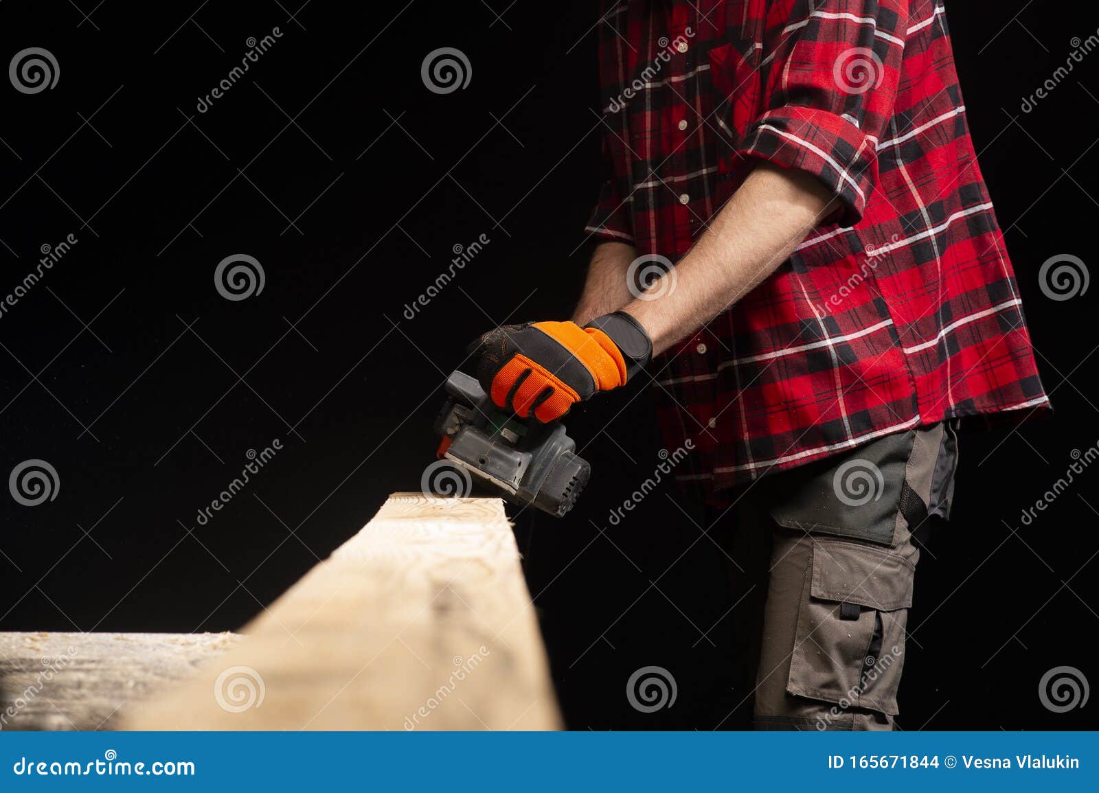 Carpenter Works with Electrical Planer Stock Photo - Image of plane ...
