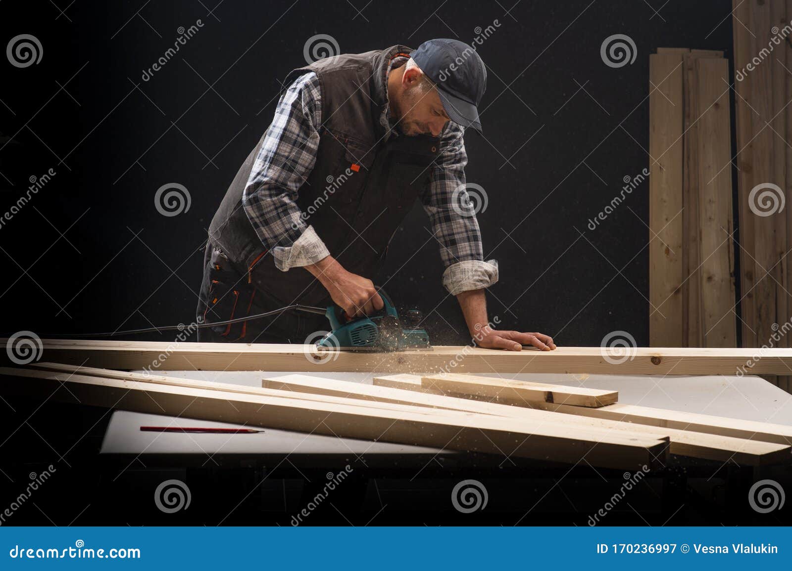 Carpenter Works with Electrical Planer Stock Image - Image of handmade ...