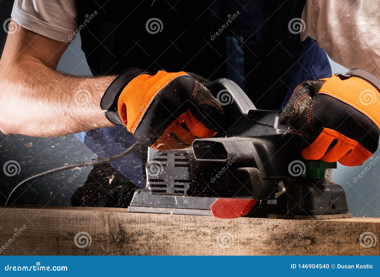 Carpenter Works with Electrical Planer Stock Photo - Image of iron ...