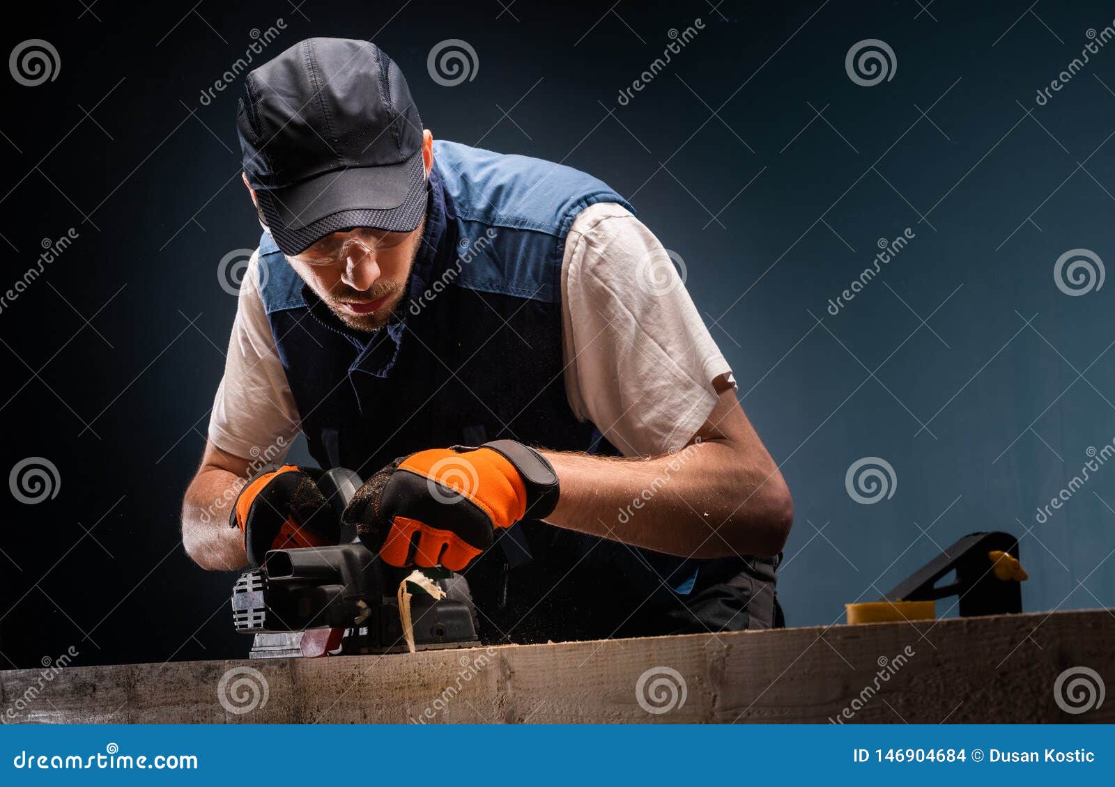 Carpenter Works with Electrical Planer Stock Photo - Image of sanding ...