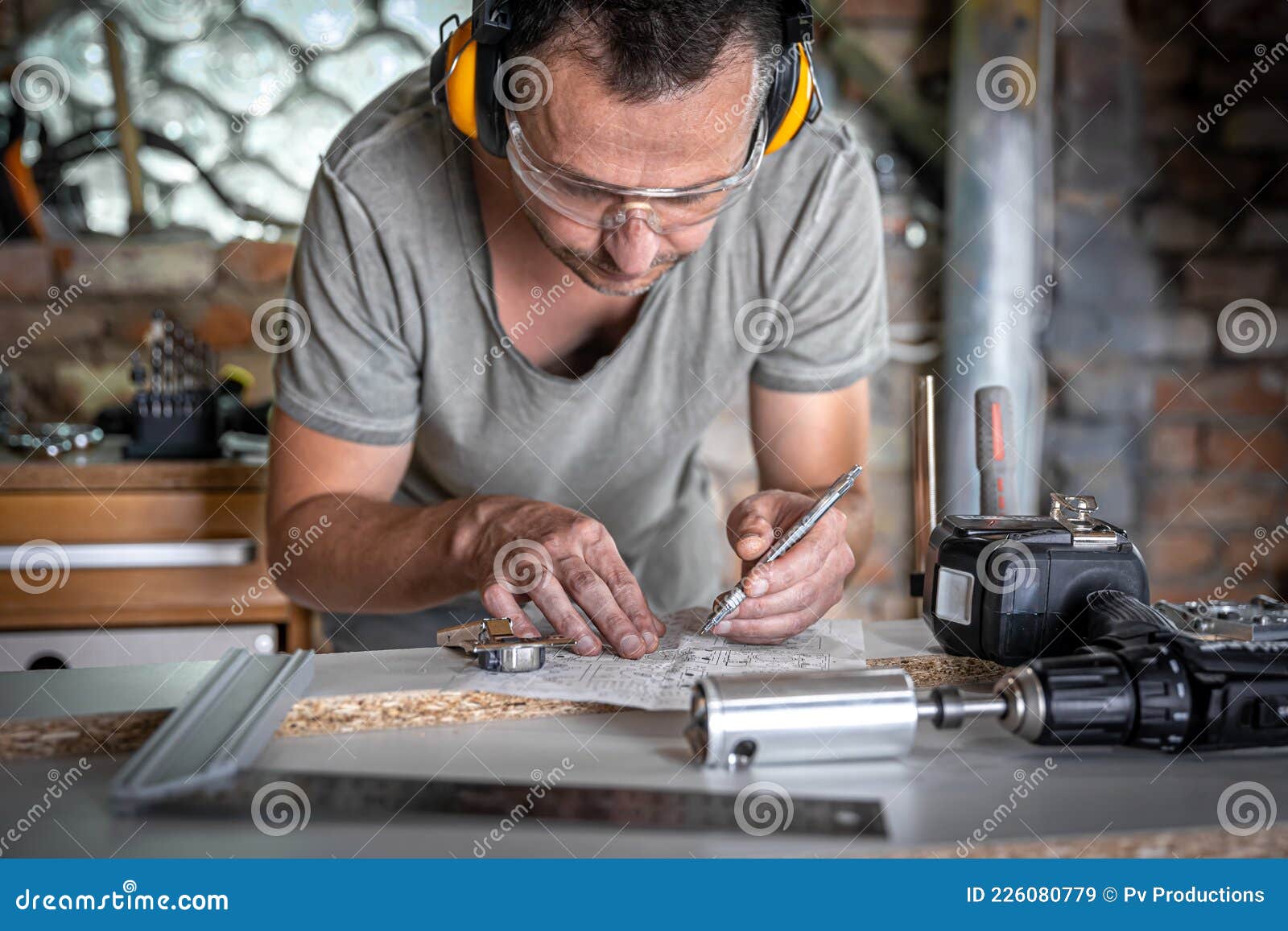 A Carpenter Works with Professional Woodworking Tools Stock Image ...
