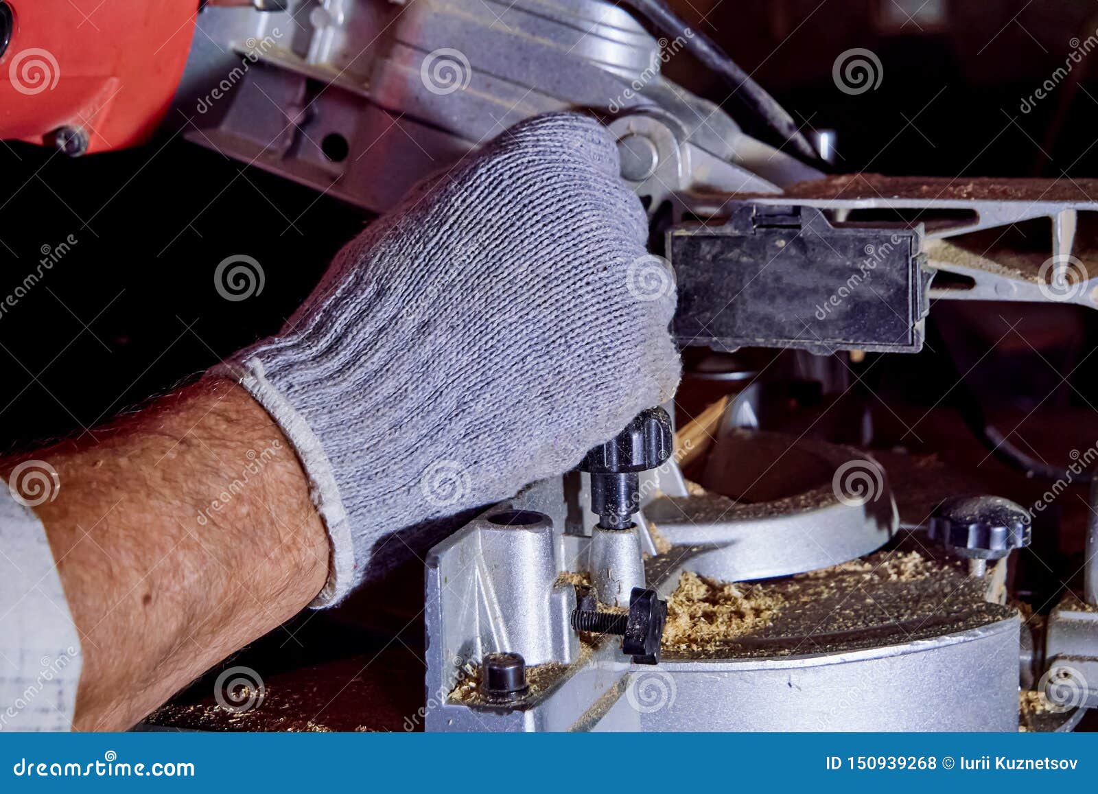Carpenter Works on Woodworking Machines in the Carpentry Workshop ...