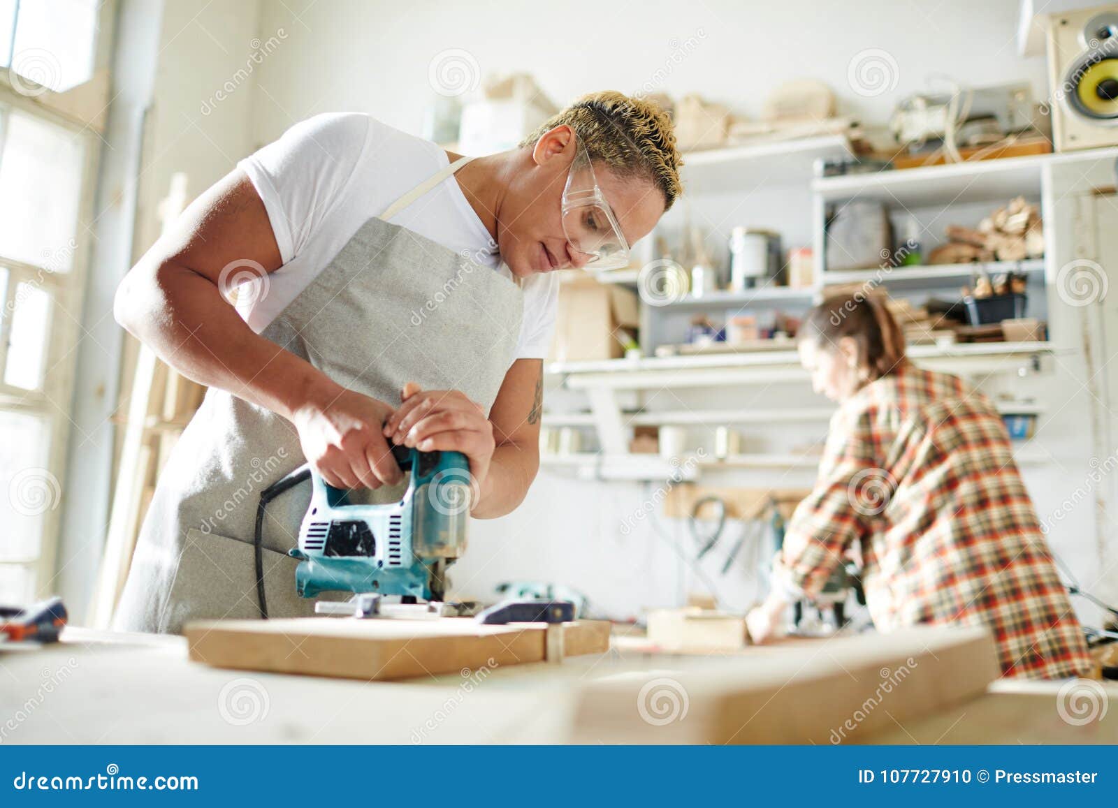Carpenter in workshop stock photo. Image of professional - 107727910