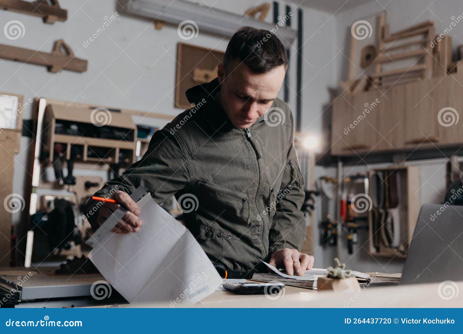 Carpenter Writes on a Notebook, Graphite Pencil and Clipboard with ...