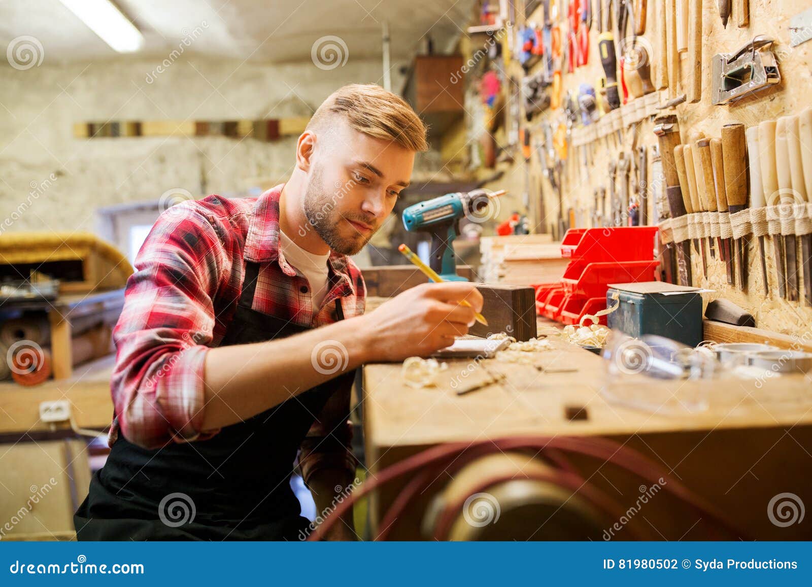 Carpenter Writing To Notebook at Workshop Stock Photo - Image of pencil ...