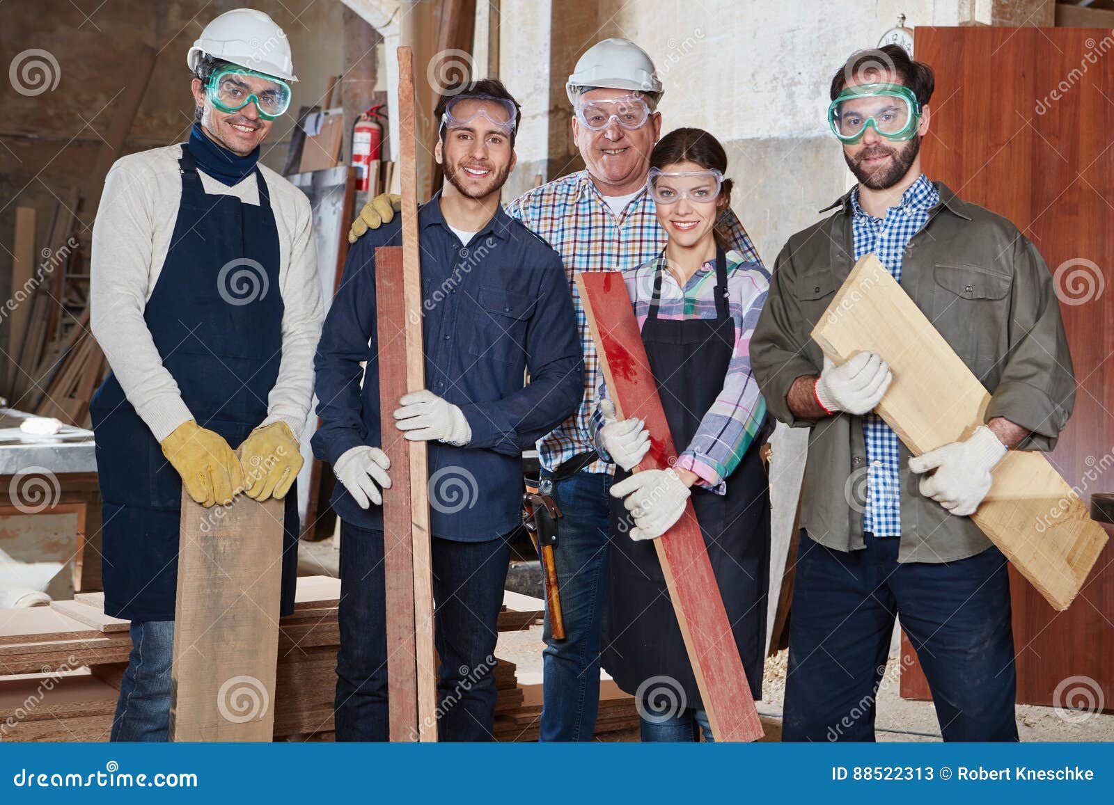 Carpenters Team Holding Wood Stock Image - Image of collar, female ...