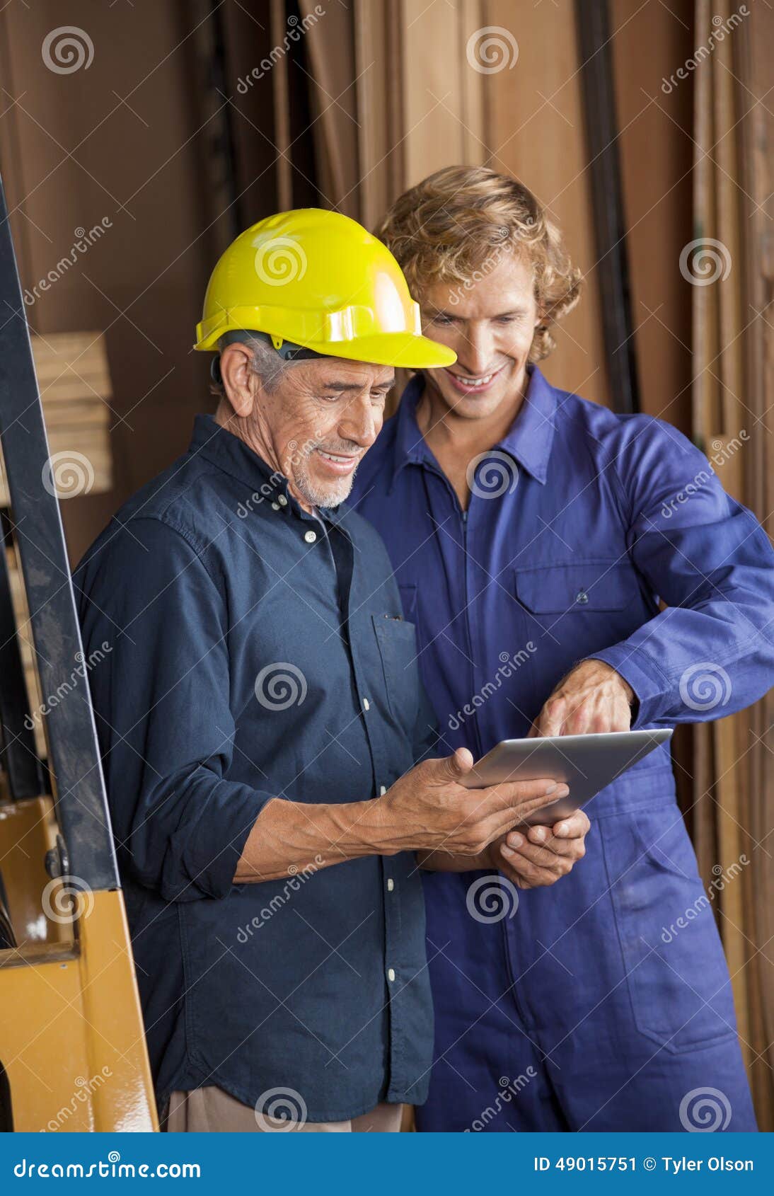 Carpenters Using Tablet Computer in Workshop Stock Image - Image of ...