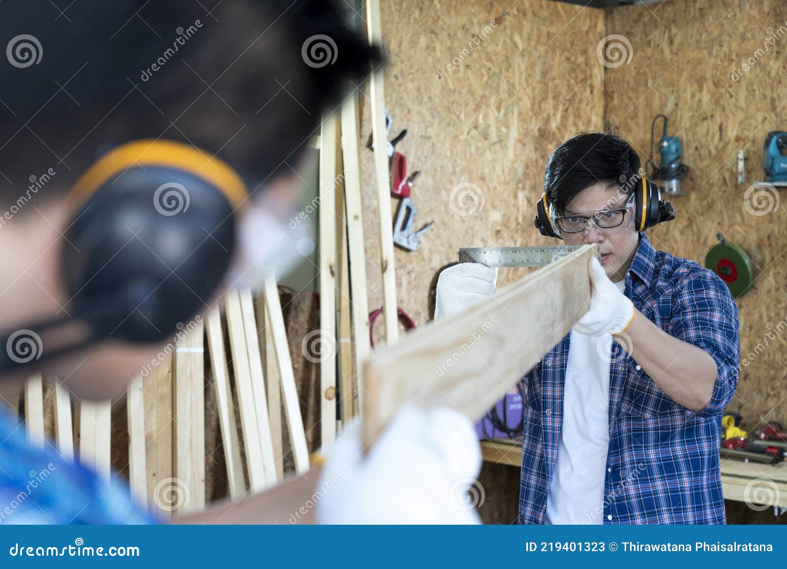 Carpenters Working in Teamwork. Two Young Man As Carpenter Work in the ...