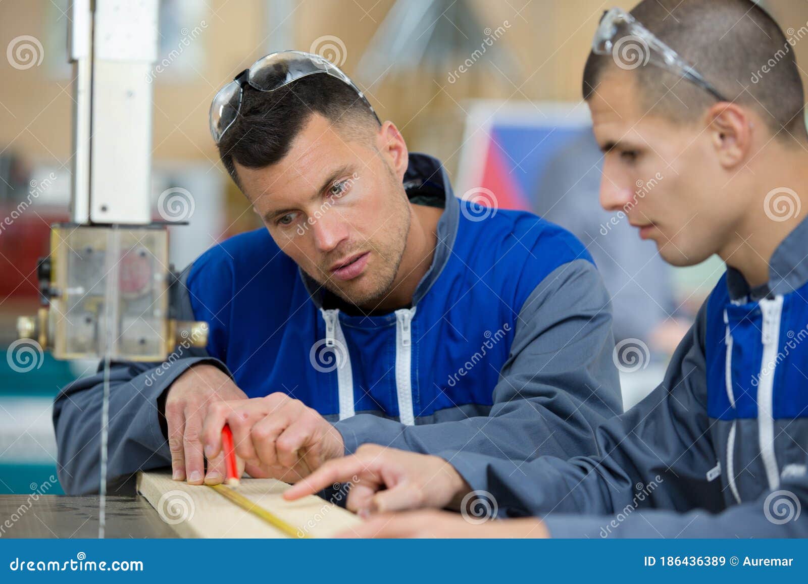 Carpentry Apprentice Demonstrating Machine Operation Stock Image ...