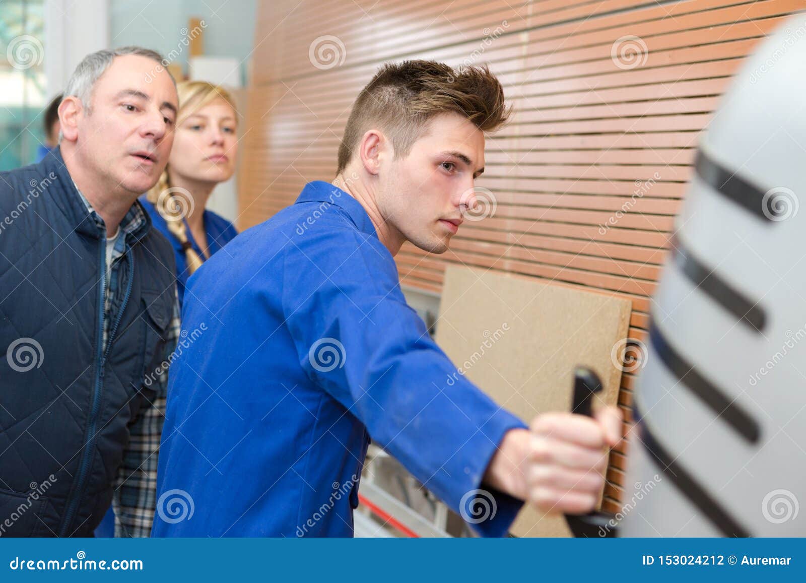 Carpentry Apprentice Demonstrating Machine Operation Stock Photo ...