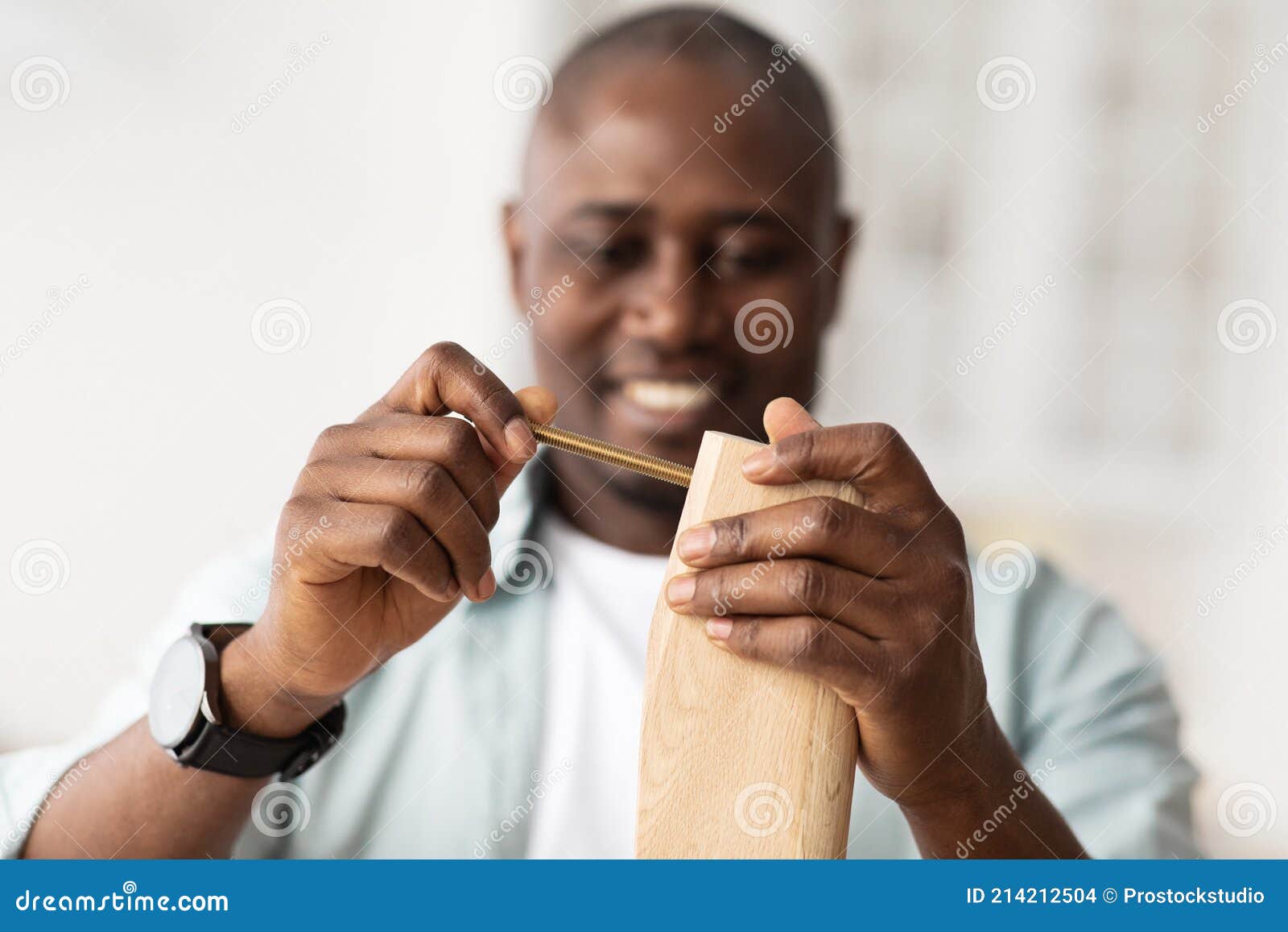 Carpentry And Furniture Assembly African American Man Assembling