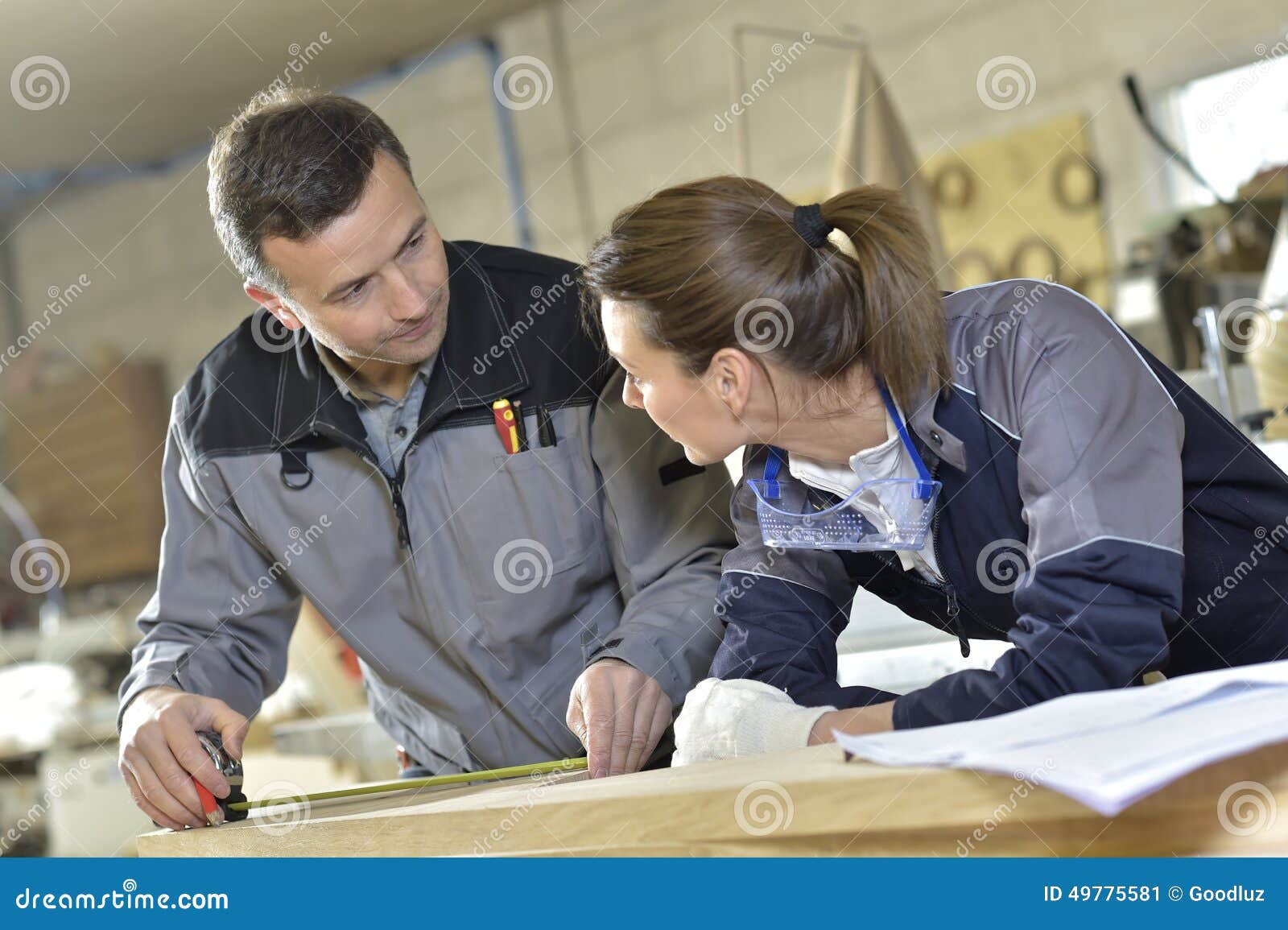 Carpentry Instructor with Trainee Working Stock Image - Image of ...