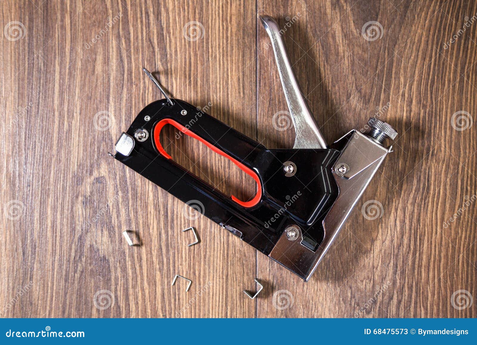 Carpentry Stapler ,Construction Machinery Held Stapler On Wooden Stock ...