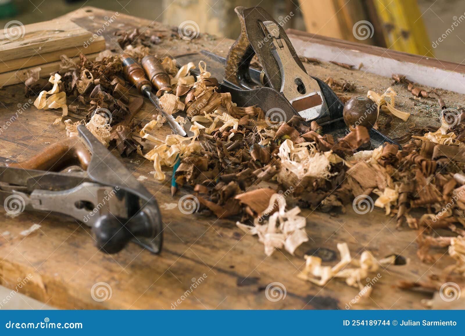 Carpentry Tools. a Carpenter`s Work Table, Full of Tools and Wood Waste ...