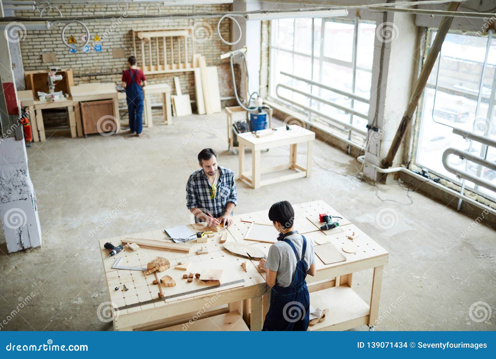 Carpentry Workers Making Wooden Frames in Workshop Stock Photo - Image ...