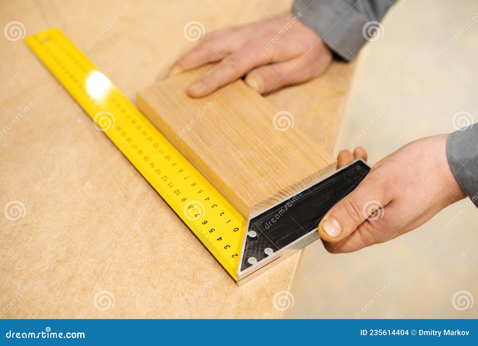 Carpentry Works. the Process of Measuring a Board with a Ruler To ...