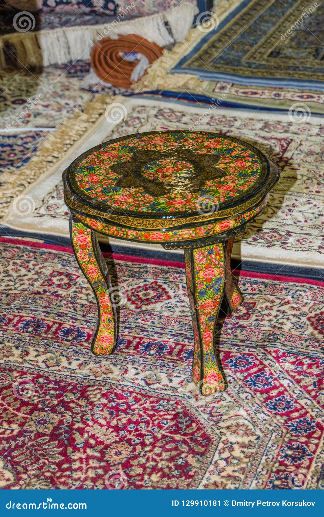 On the Carpet is a Carved Table with a Mosaic Pattern Stock Image ...