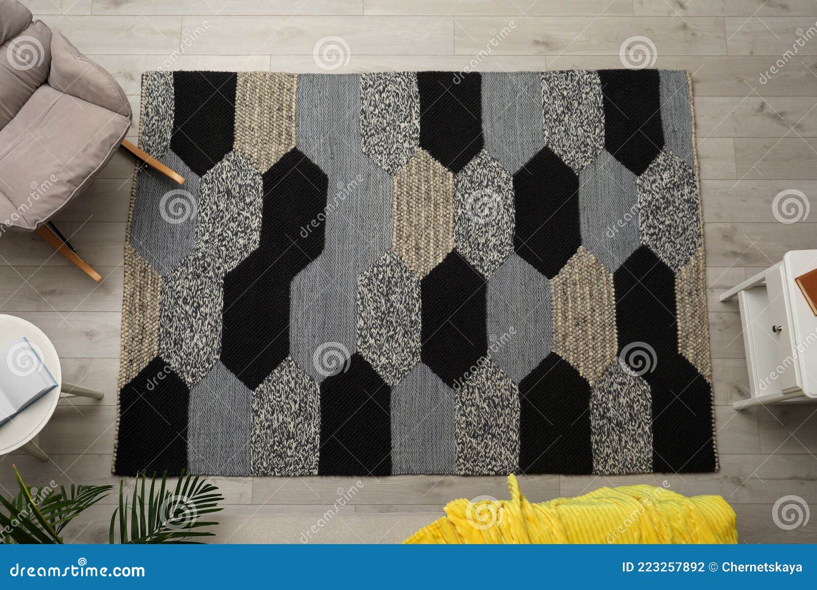 Carpet with Geometric Pattern on Floor in Room, Top View Stock Photo ...