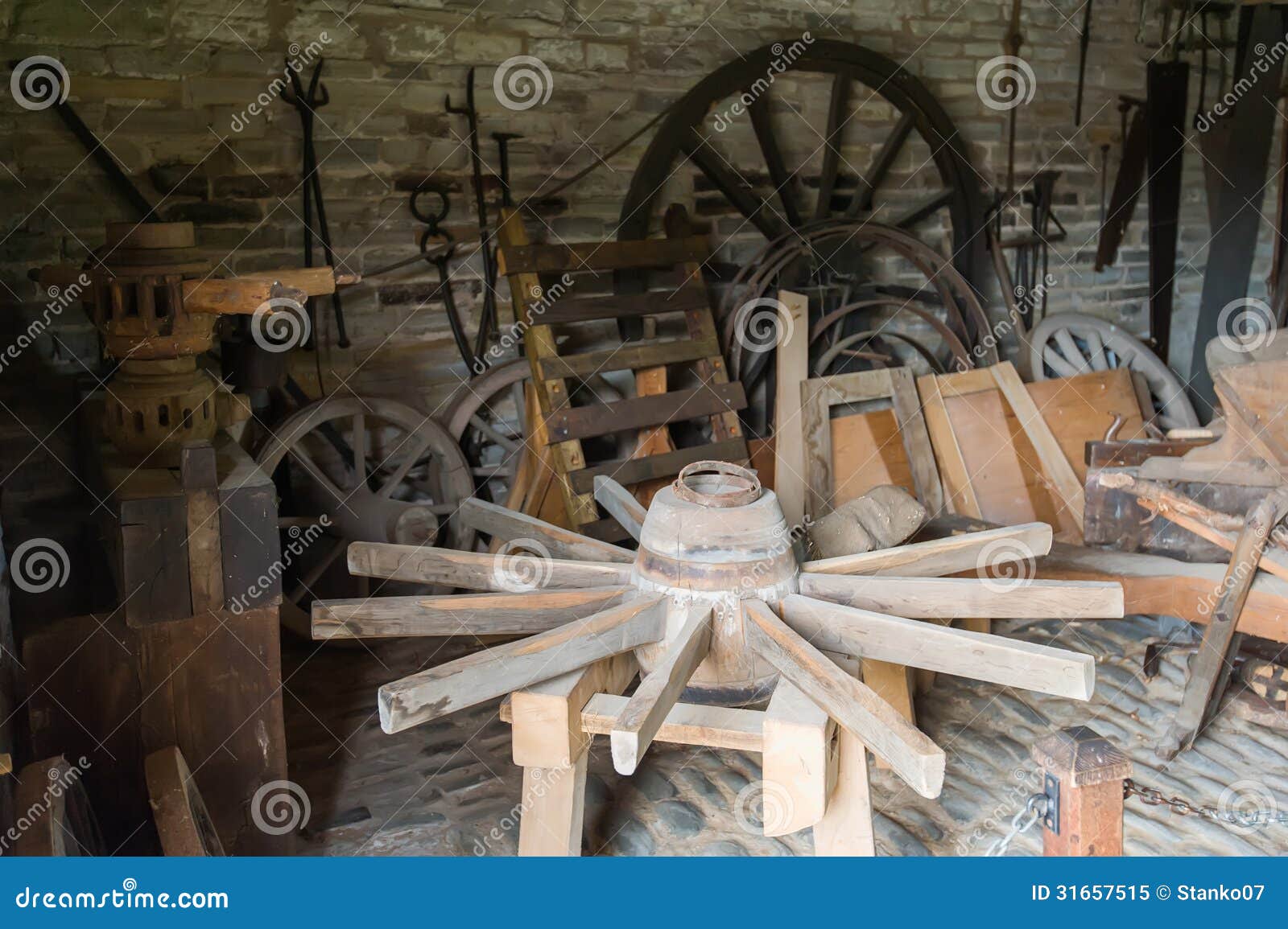 Carriage wheels workshop stock image. Image of construction - 31657515