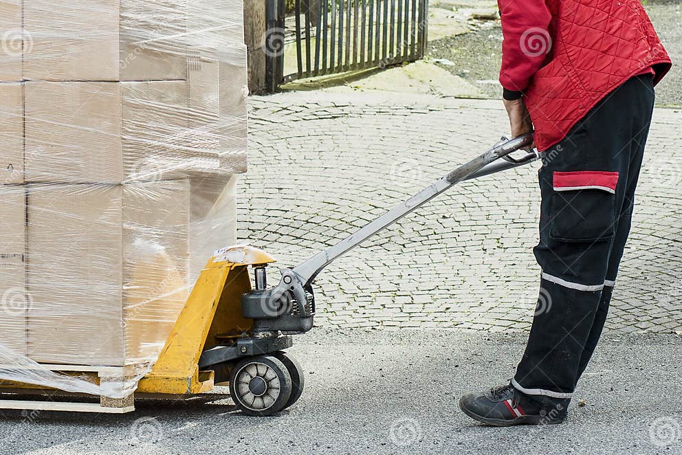 Carrier Moving Boxes Using a Fork Lift Stock Photo - Image of stack ...