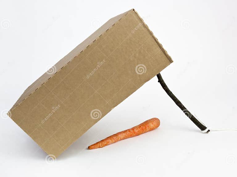 Carrot, box and stick trap stock image. Image of container - 194163055