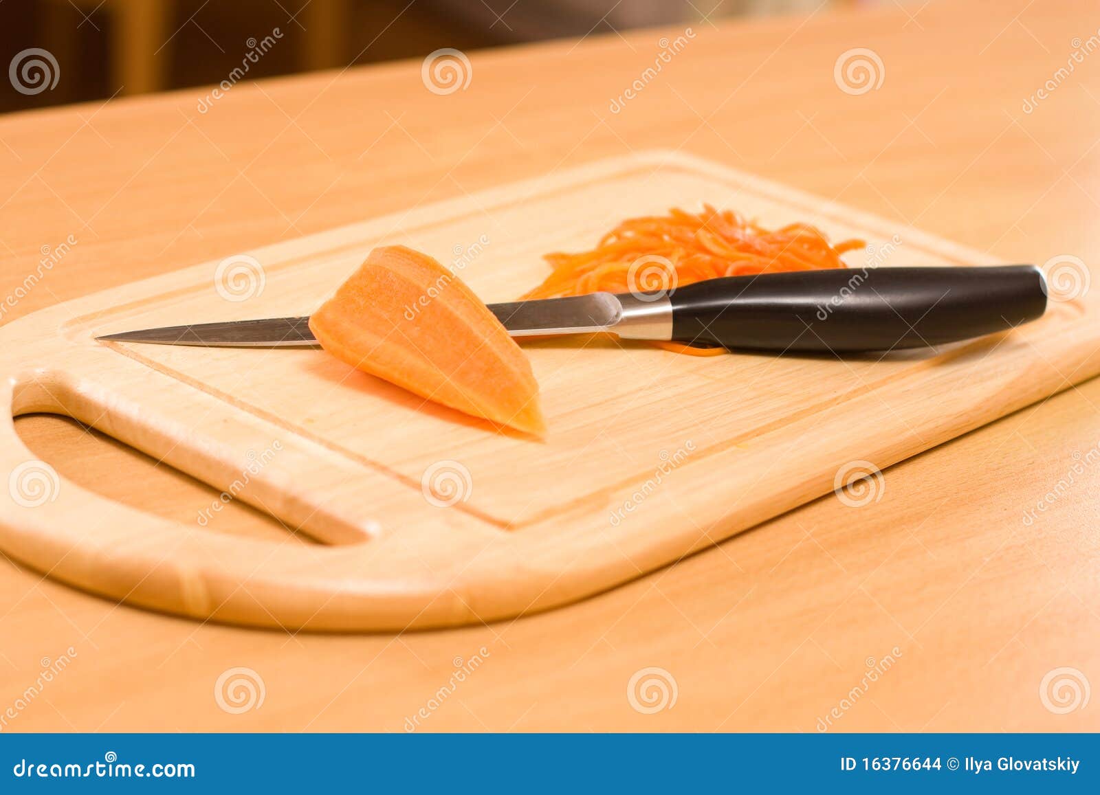 Carrot and knife stock photo. Image of closeup, black - 16376644