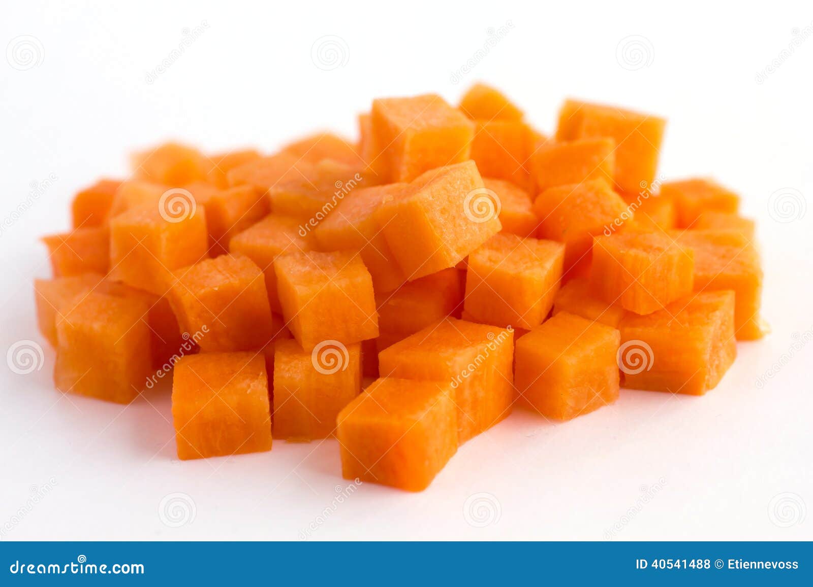 Carrot Neatly Chopped into Cubes Stock Photo - Image of focus, white ...