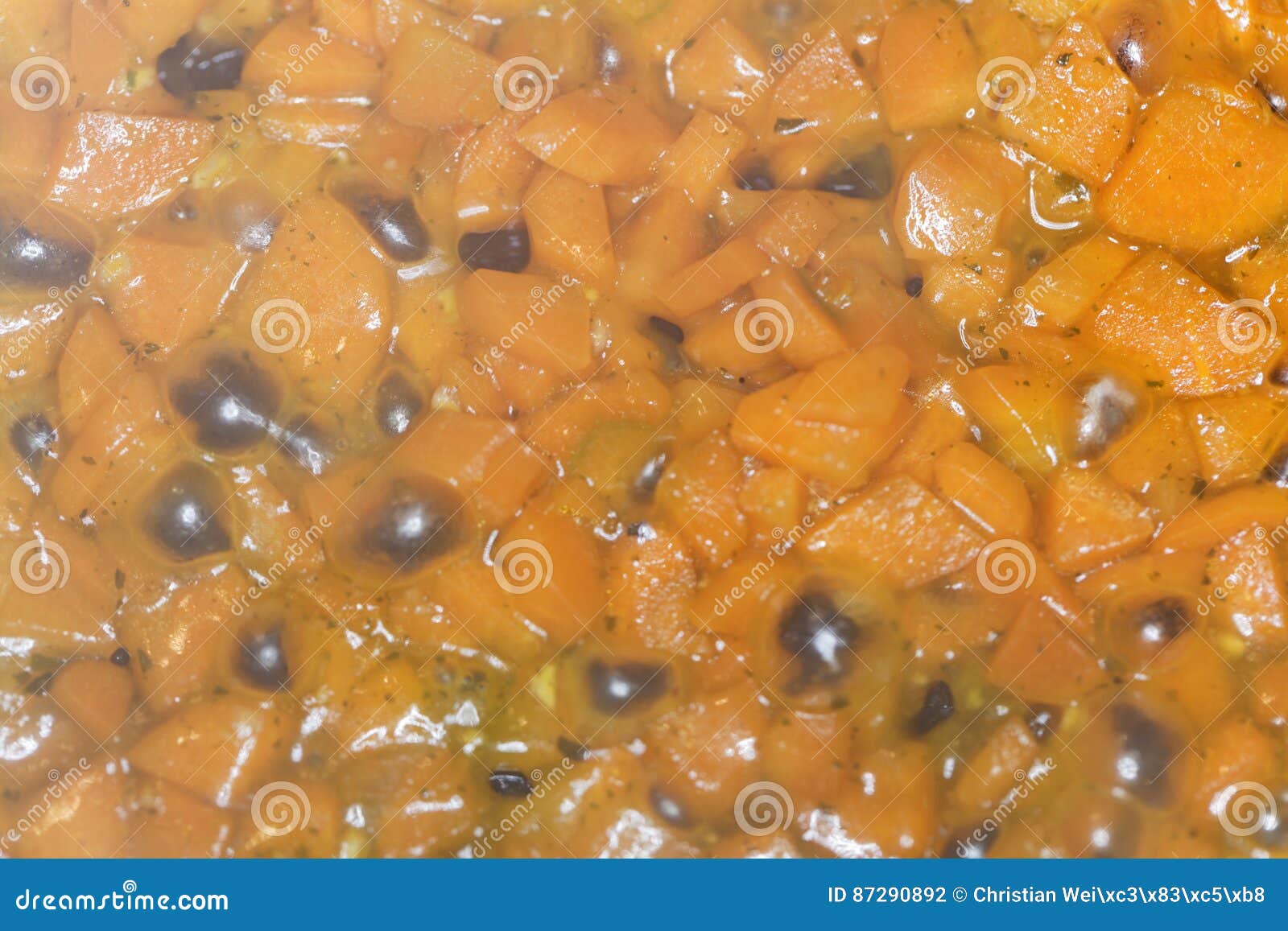 Carrots in a cooking pot stock photo. Image of sauce - 87290892