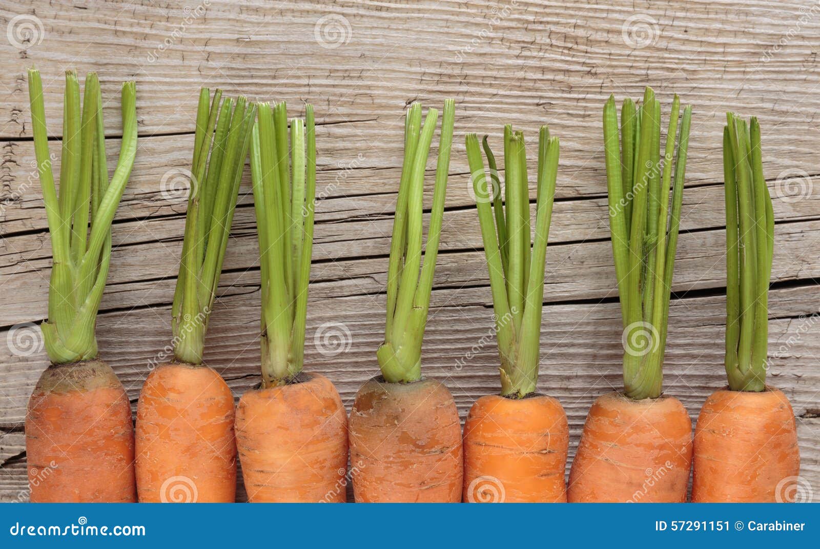Carrots on wooden table stock image. Image of diet, background - 57291151