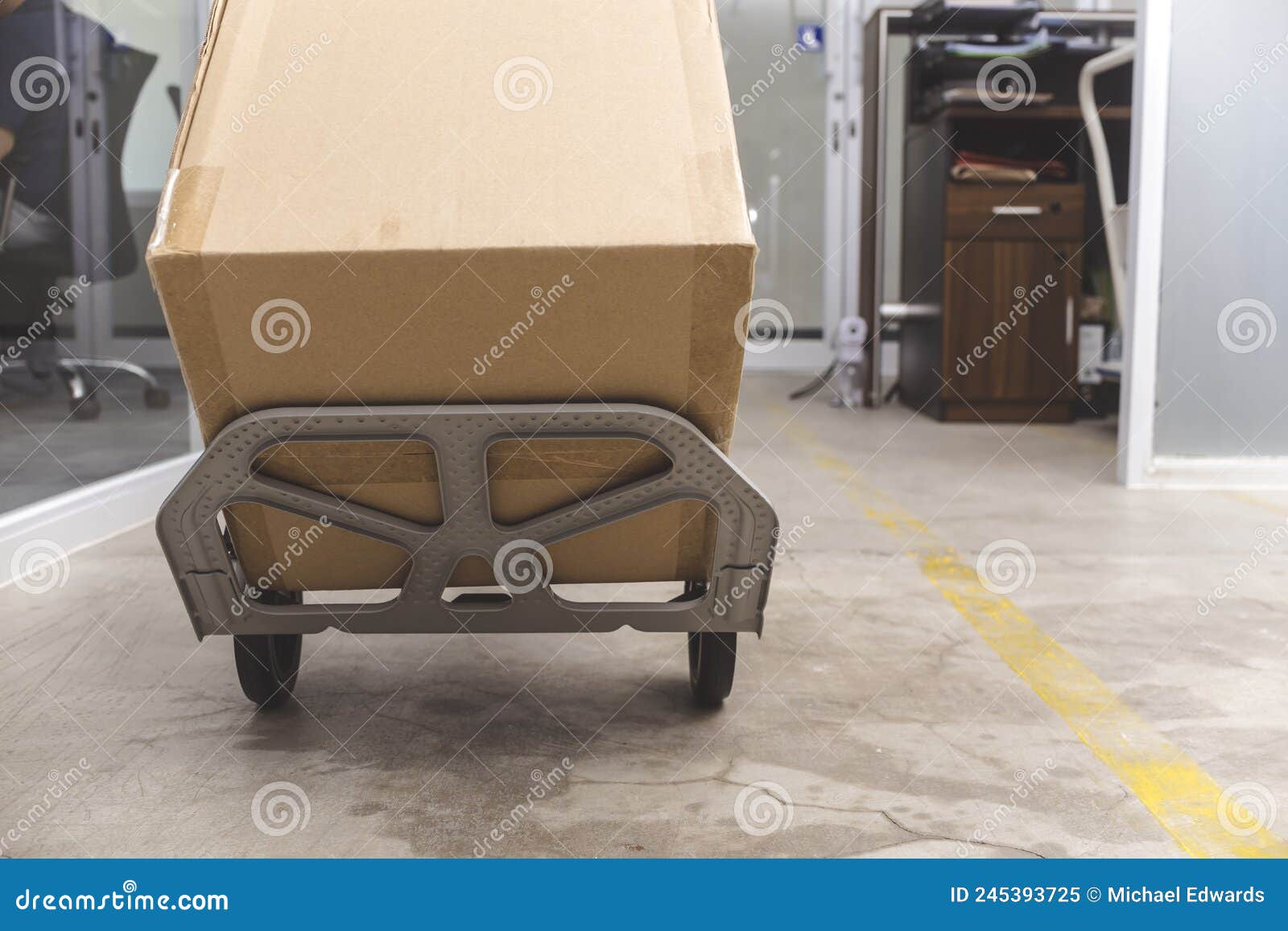 Carrying a Cardboard Box with a Heavy Duty Portable Trolley through a ...