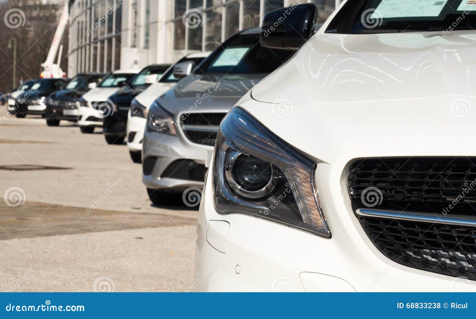 Cars in a diagonal row stock photo. Image of door, bike - 68833238