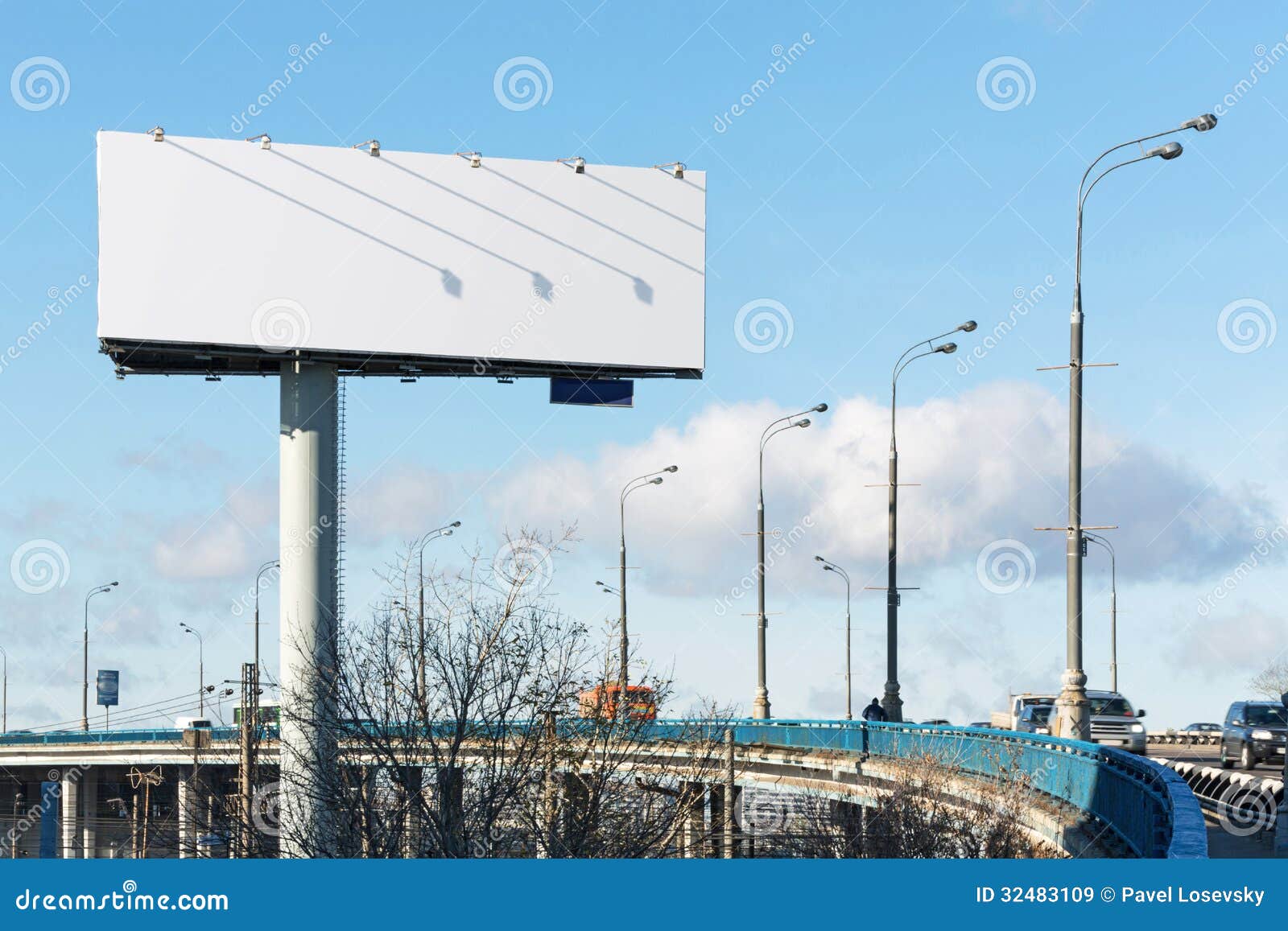 Cars Driving on the Bridge Past a Billboard Stock Image - Image of ...