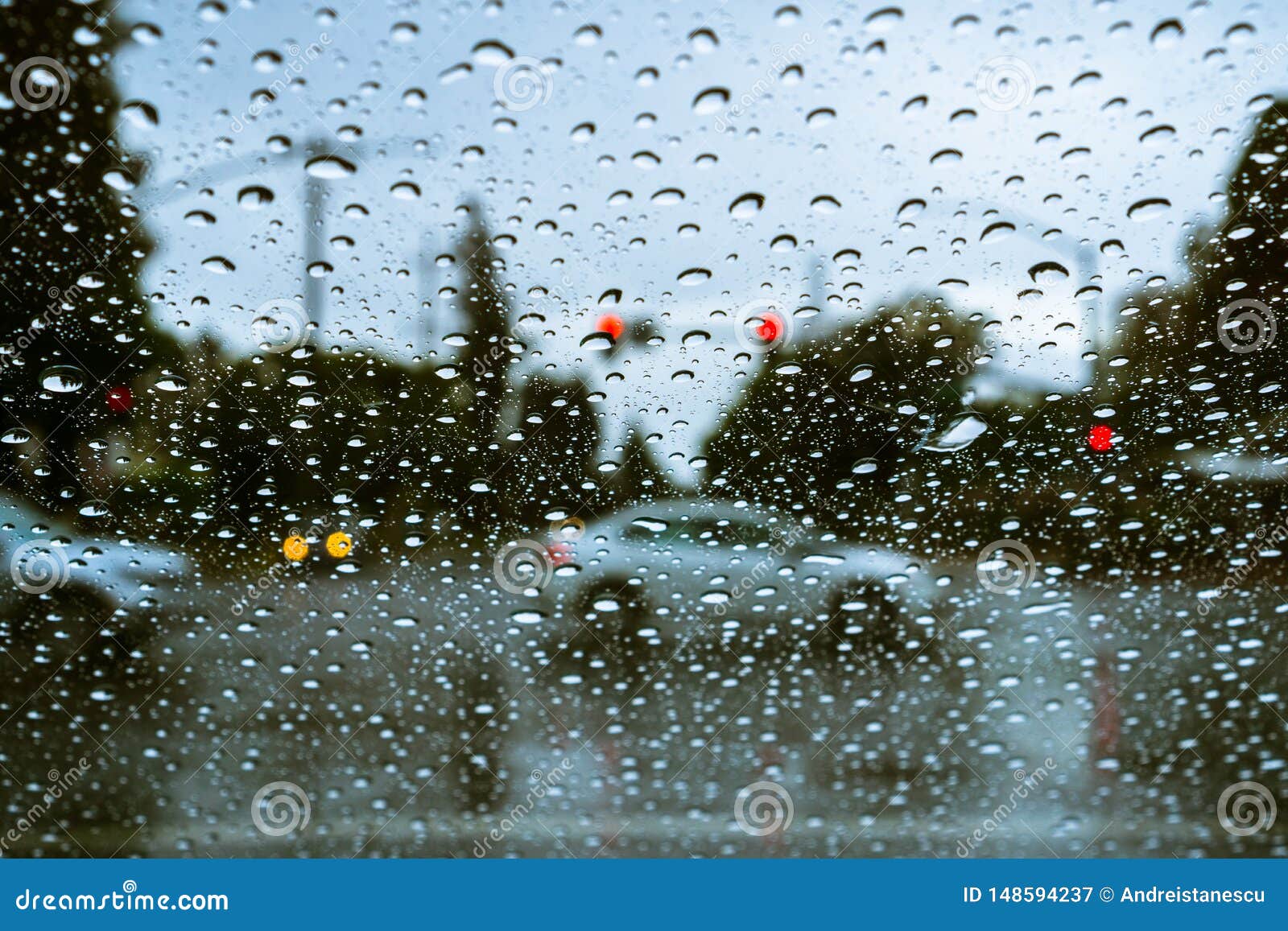Cars Driving through Rain; Raindrops on the Windshield Stock Image ...