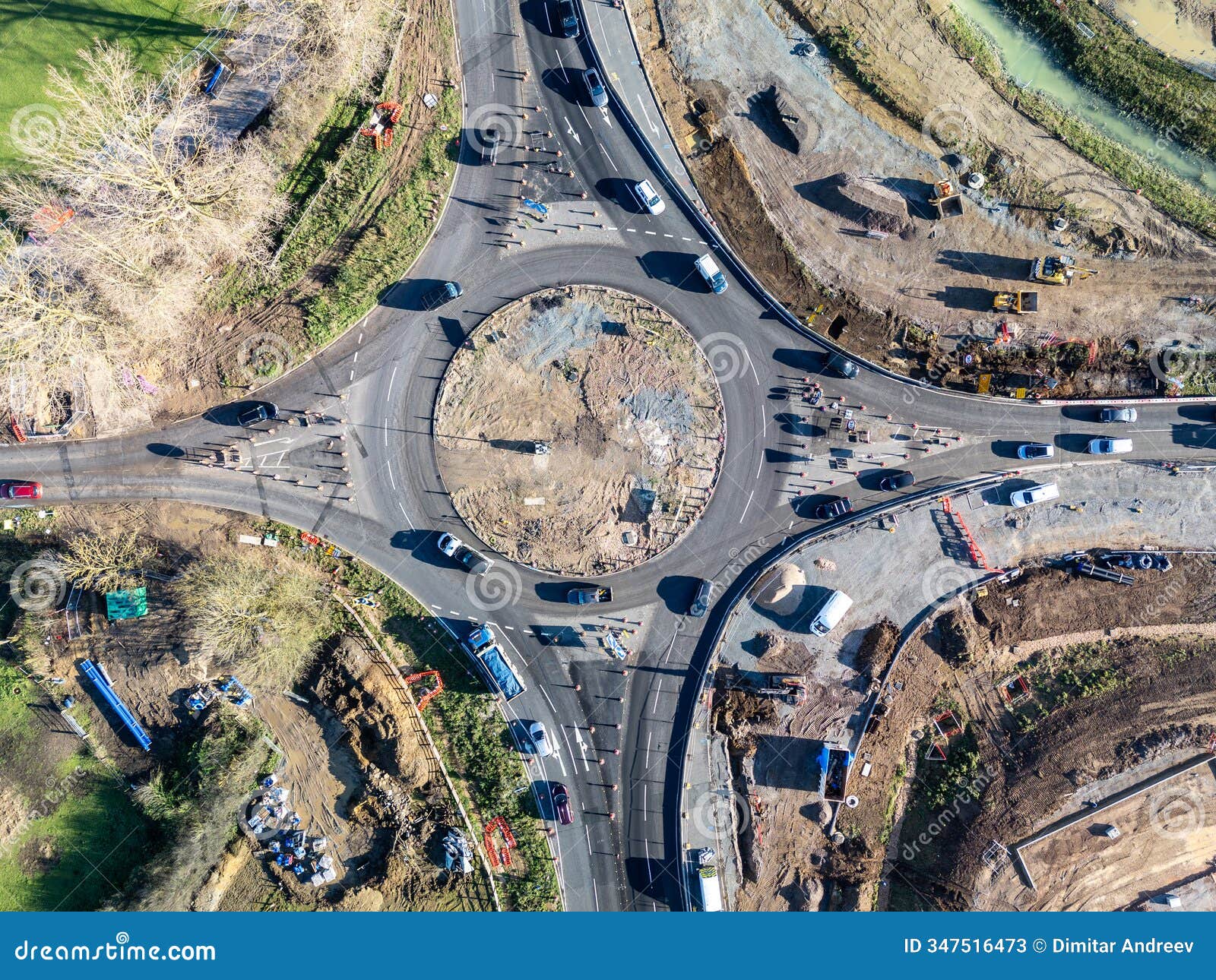 Cars Driving on Roundabout Under Construction, Aerial View of Road Work ...