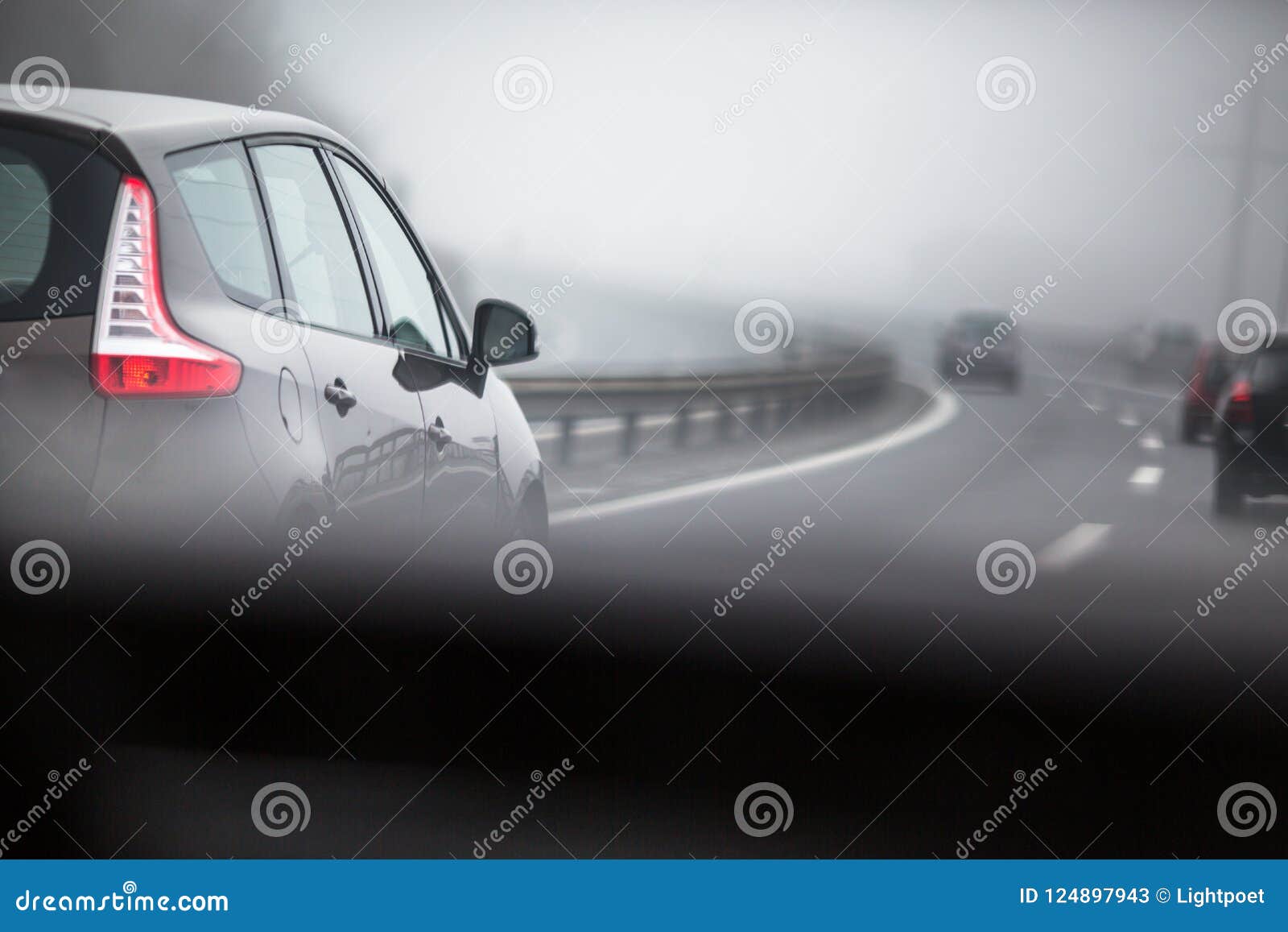Cars Going Fast Through A Curve On A Forest Road Royalty-Free Stock ...