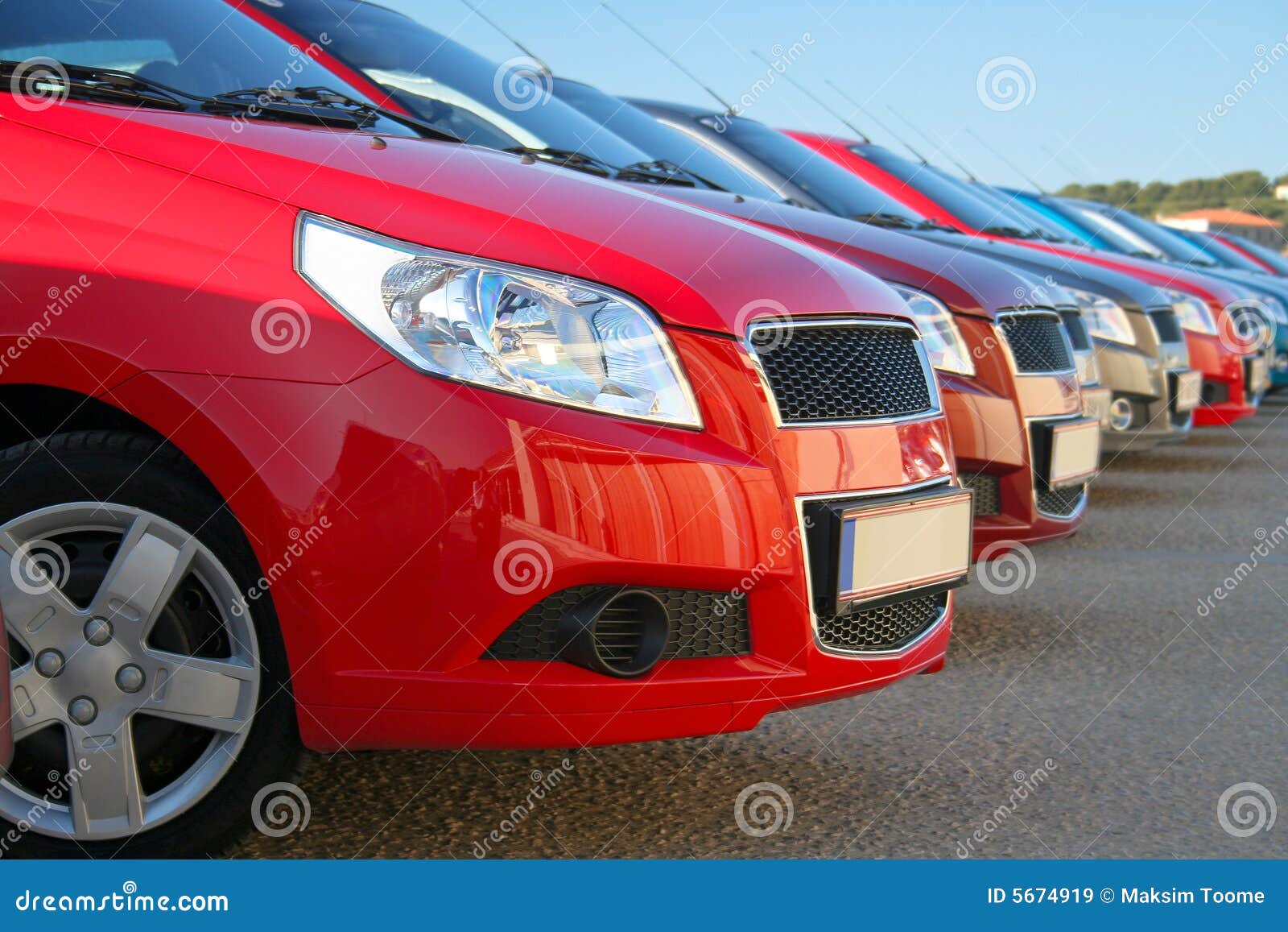 Cars parked in a row stock image. Image of road, motor - 5674919