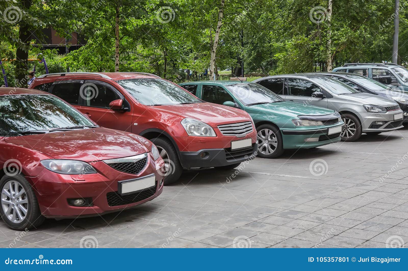 Cars parked in a row. stock image. Image of street, line - 105357801