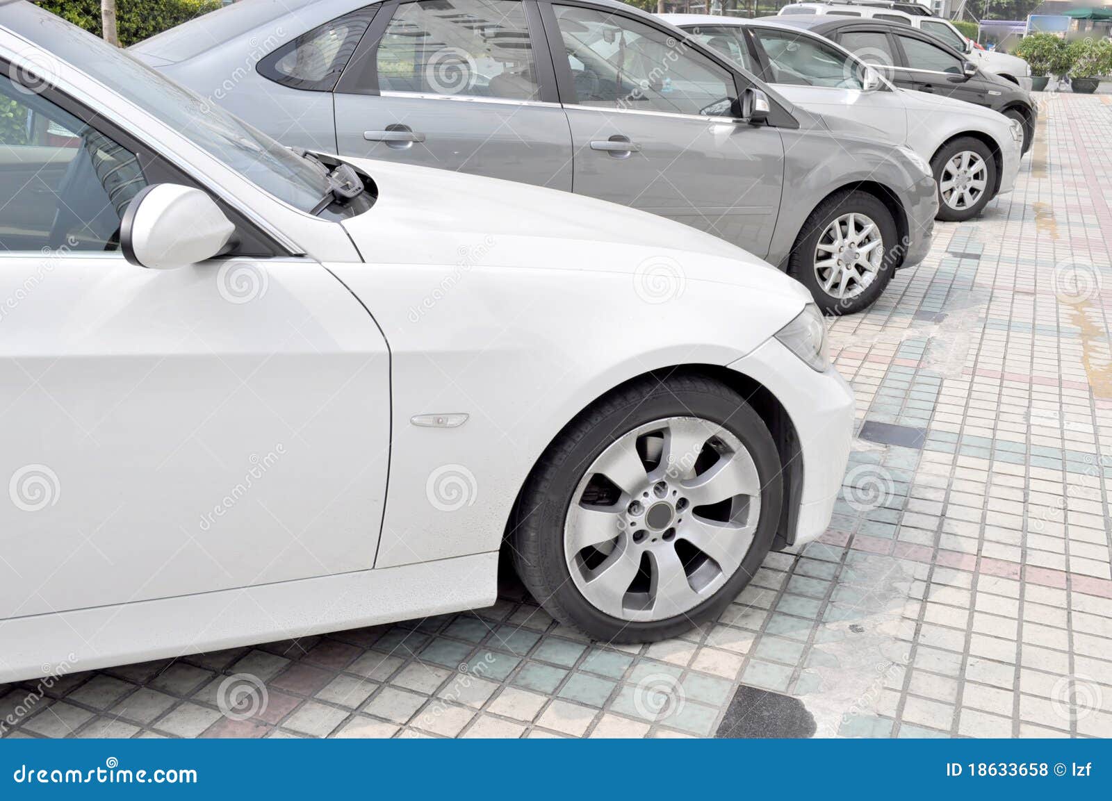 Cars parking in line stock photo. Image of bumper, line - 18633658