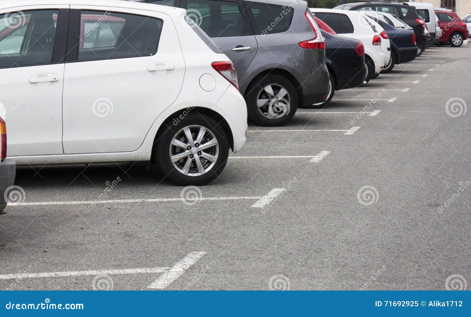 Cars in the Parking Lot in Row Stock Image - Image of automotive ...