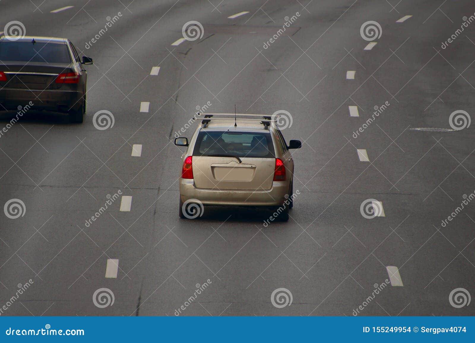 Cars racing on a freeway stock photo. Image of lane - 155249954